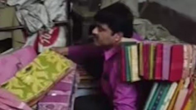 TMC Leader Hiding in Pile of Sarees Arrested